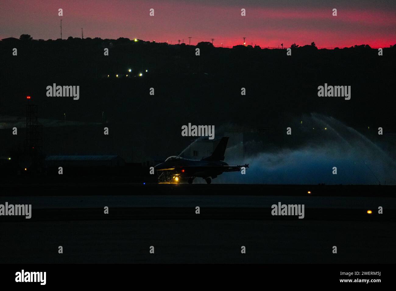 An F-16 Fighting Falcon assigned to the 114th Fighter Wing taxis ...