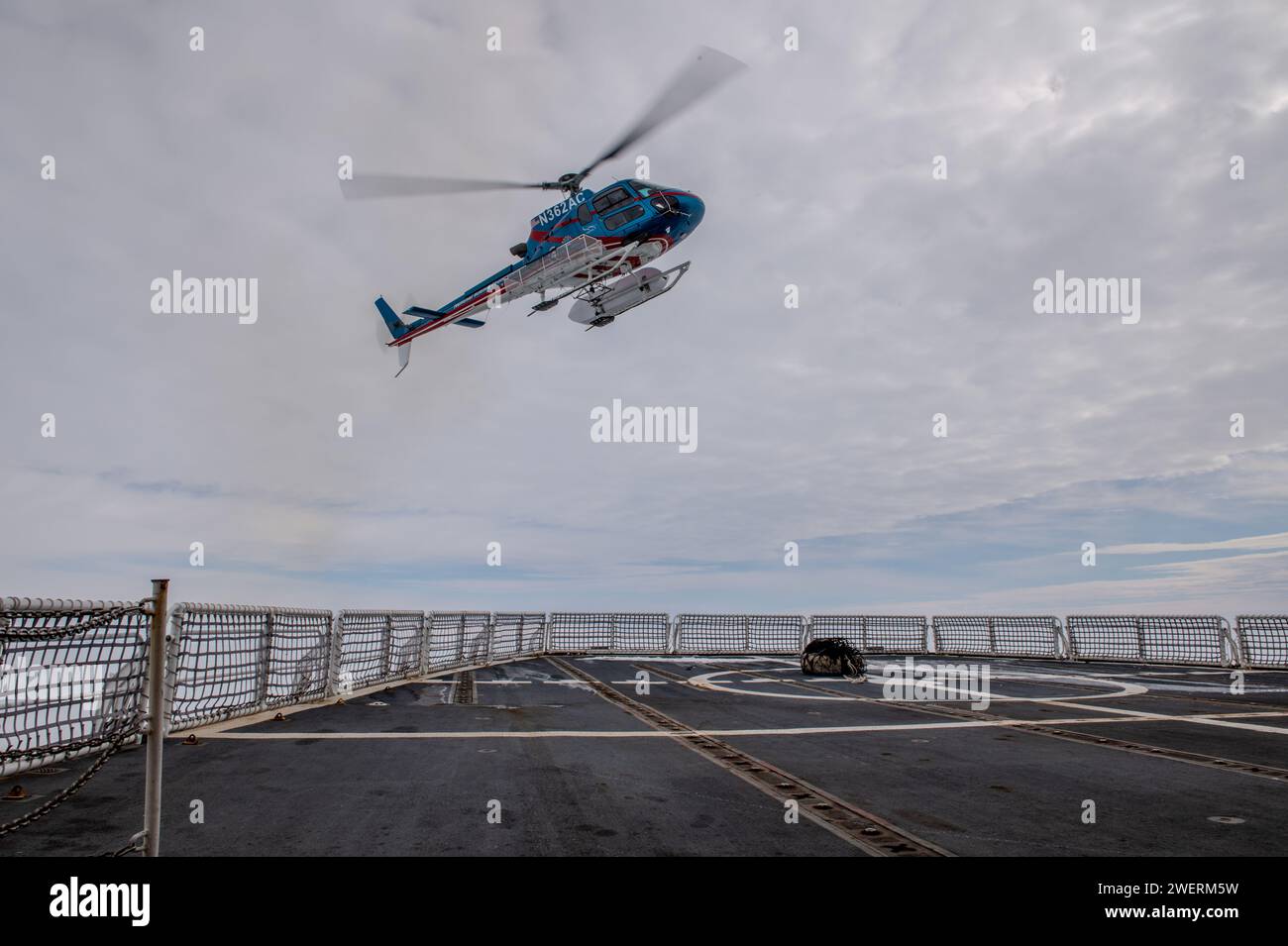 A National Science Foundation helicopter air crew departs from the U.S ...