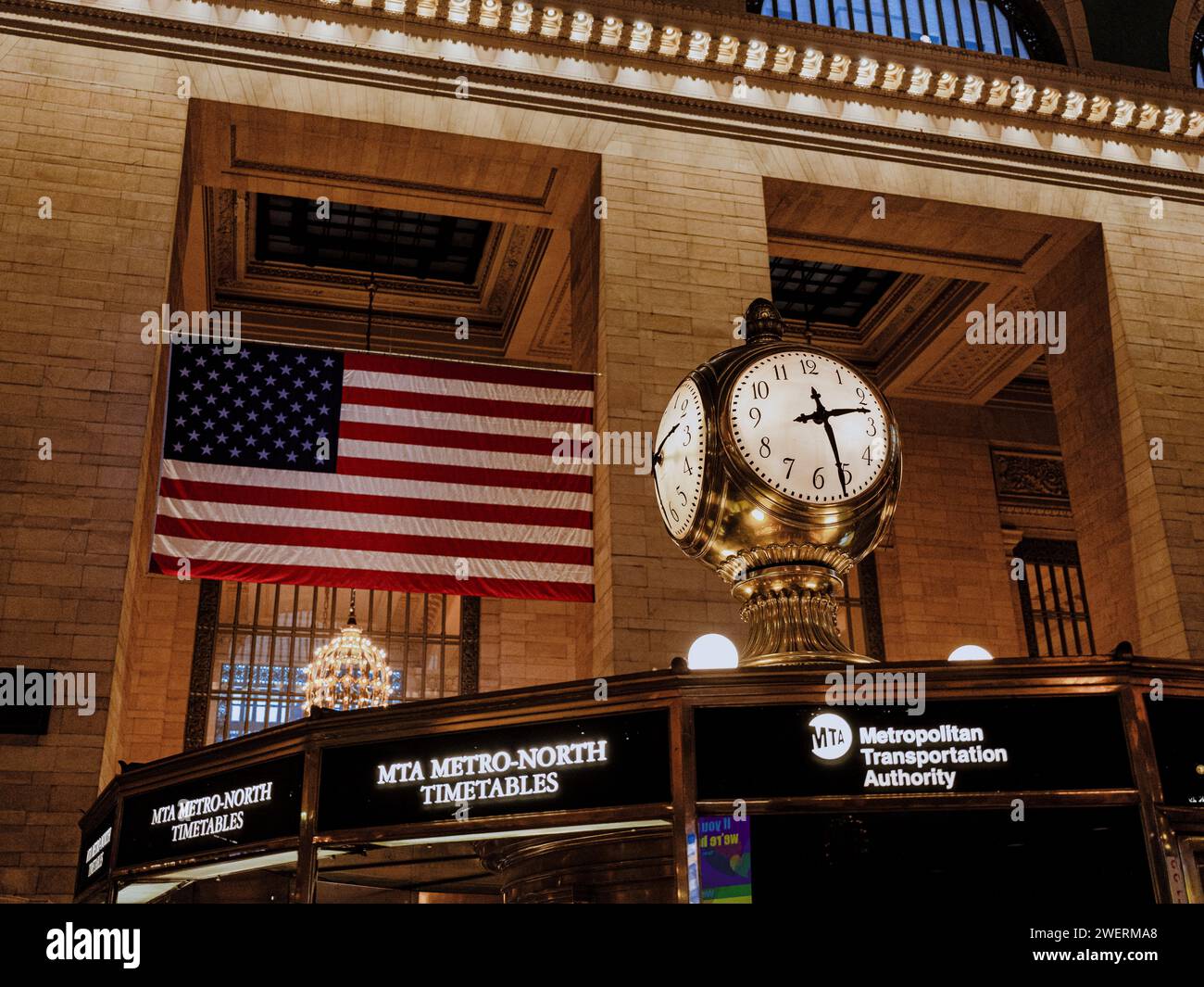 Grand Central Station, with the American Flag and Clock in frame Stock ...