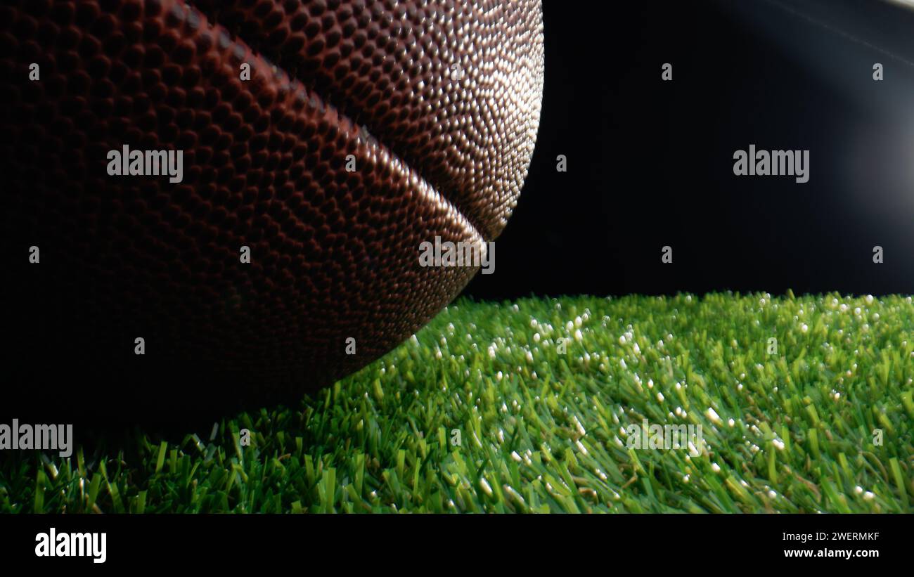 Football ball under stadium lights Stock Photo - Alamy