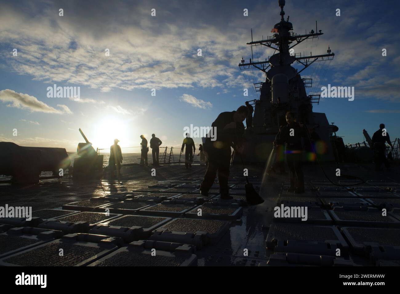 PACIFIC OCEAN (Jan. 16, 2024) U.S. Sailors conduct a fresh-water ...