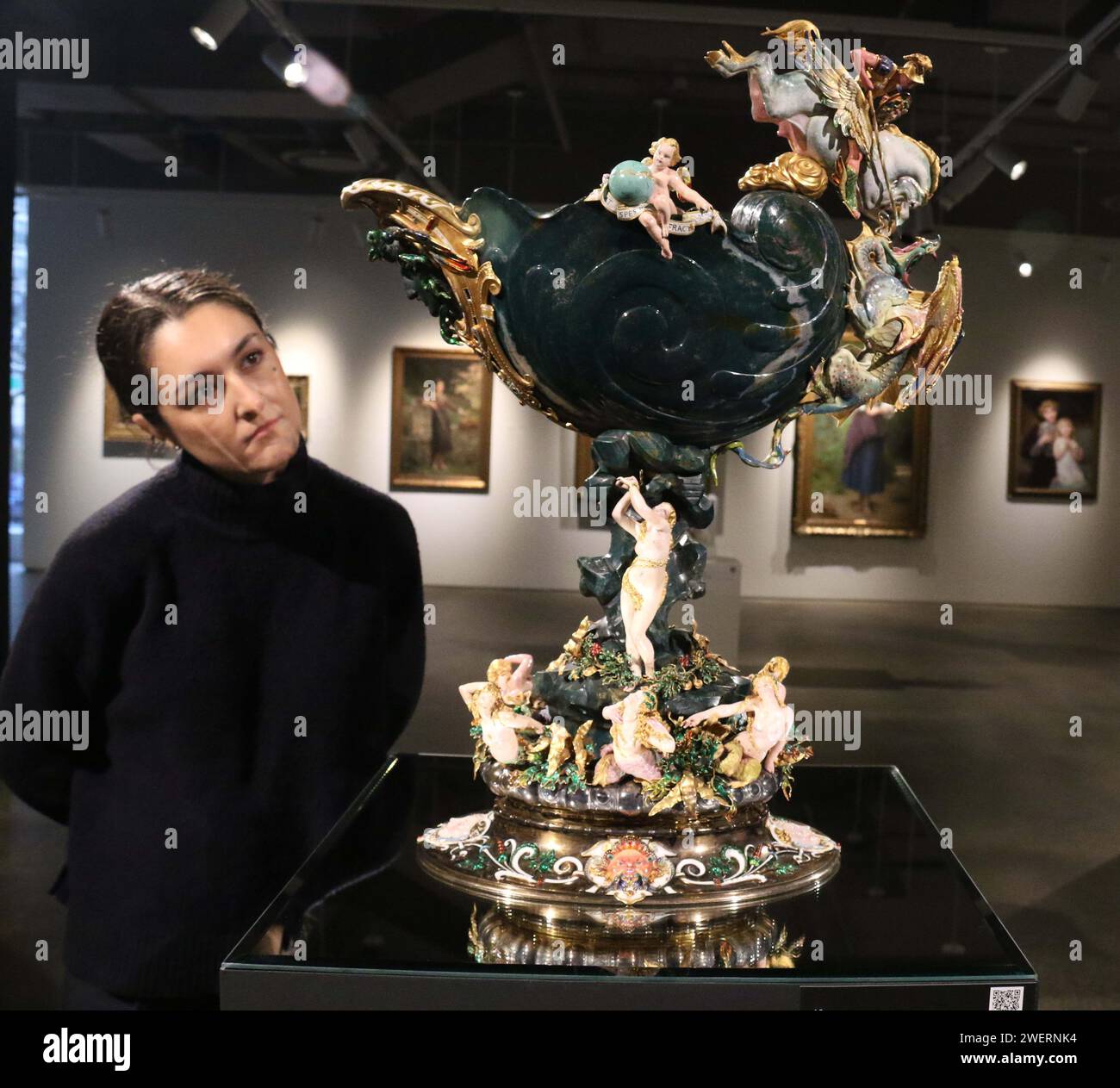New York, New York, USA. 26th Jan, 2024. A woman looks at 'The Hope Cup ...