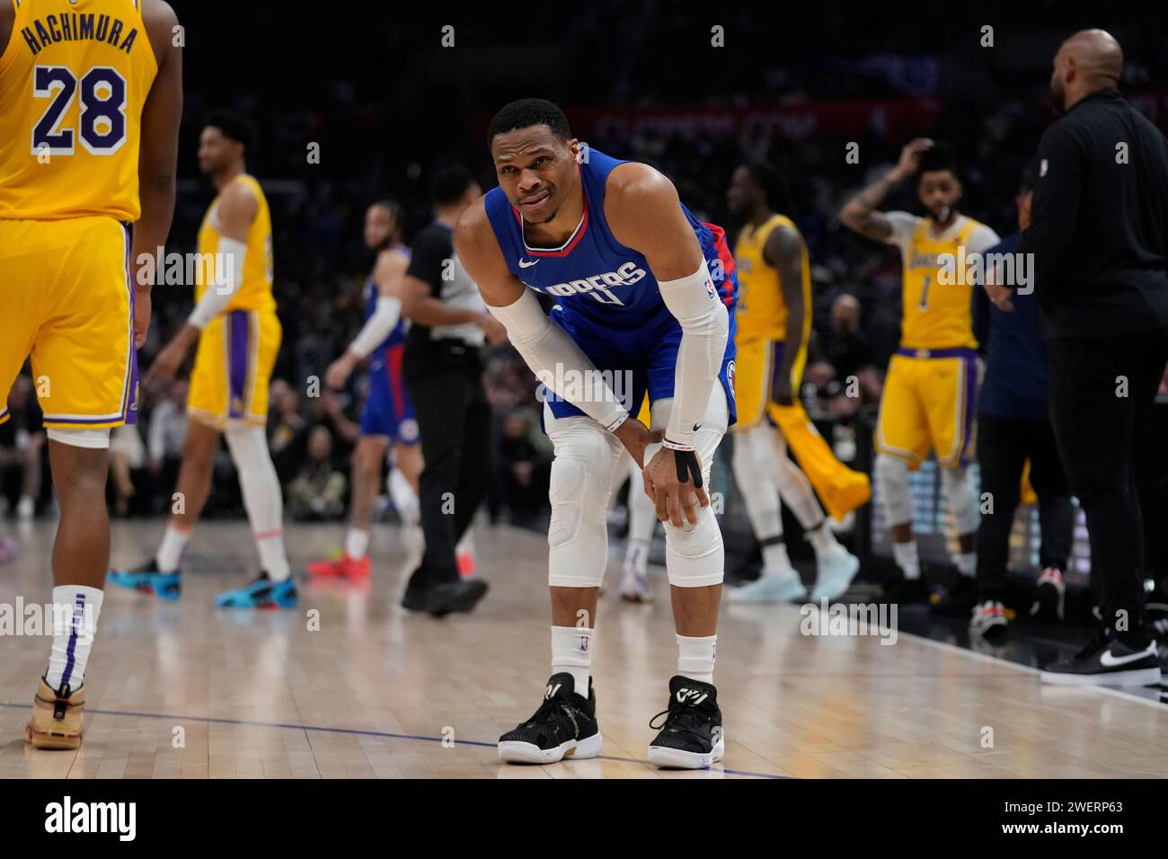 Los Angeles Clippers guard Russell Westbrook (0) reacts after an injury ...