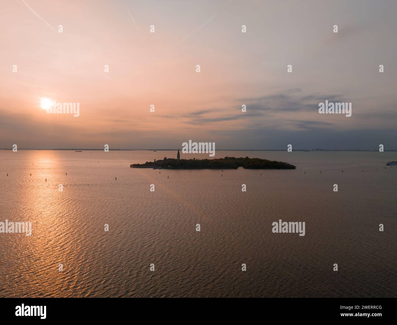 Aerial view of the plagued ghost island of Poveglia in the Venetian ...