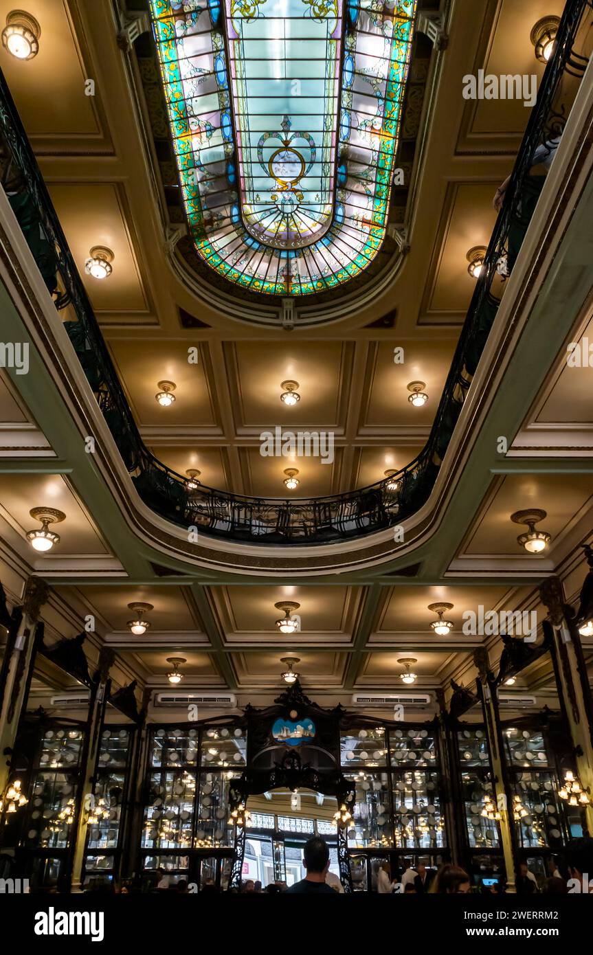 A stained glass skylight on the decorated ceiling of Confeitaria ...