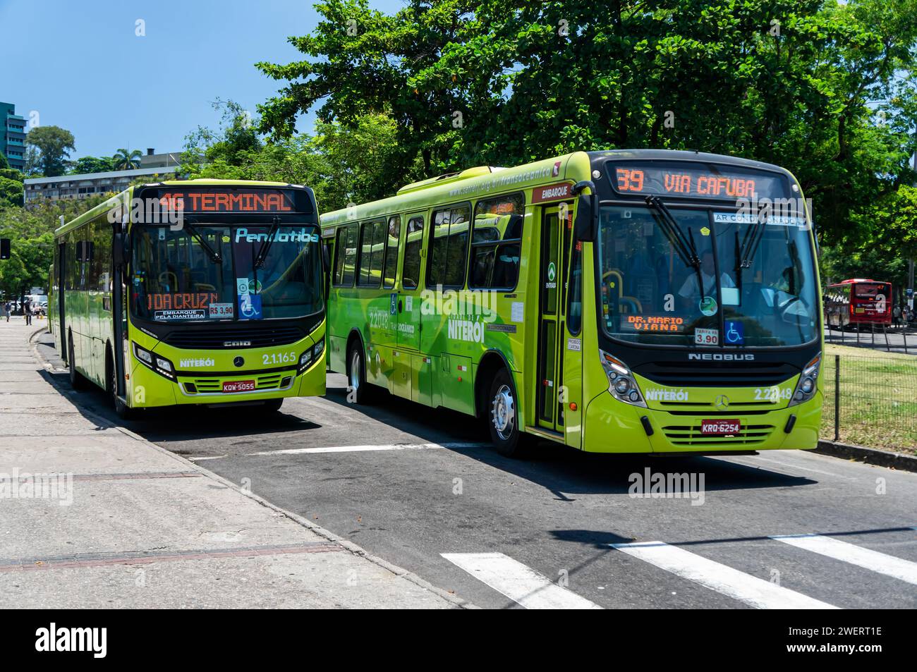 A couple of Mercedes Benz transit city buses passing by Arariboia ...
