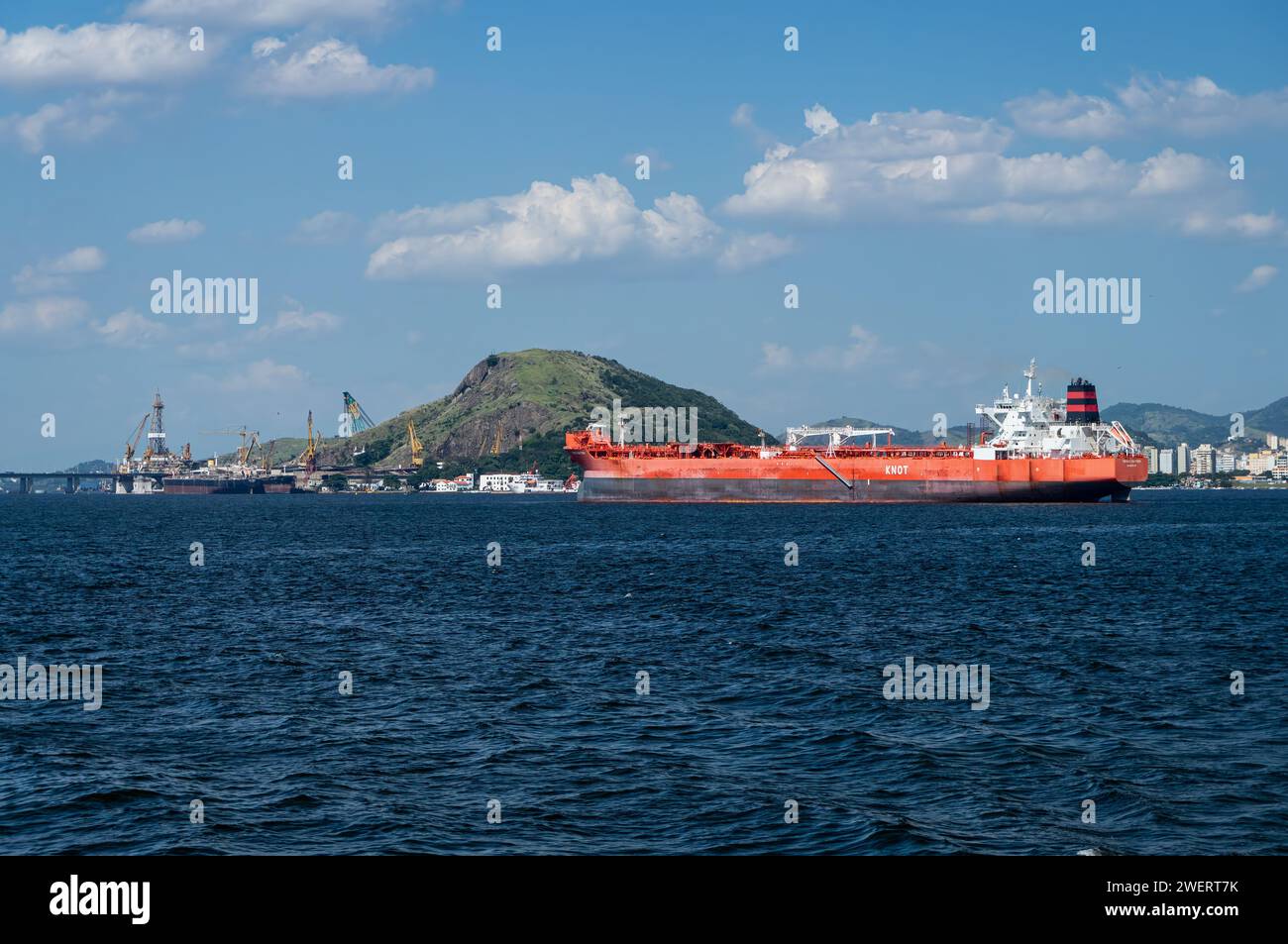 Big crude oil tanker Tordis Knutsen ship anchored on Guanabara bay blue ...