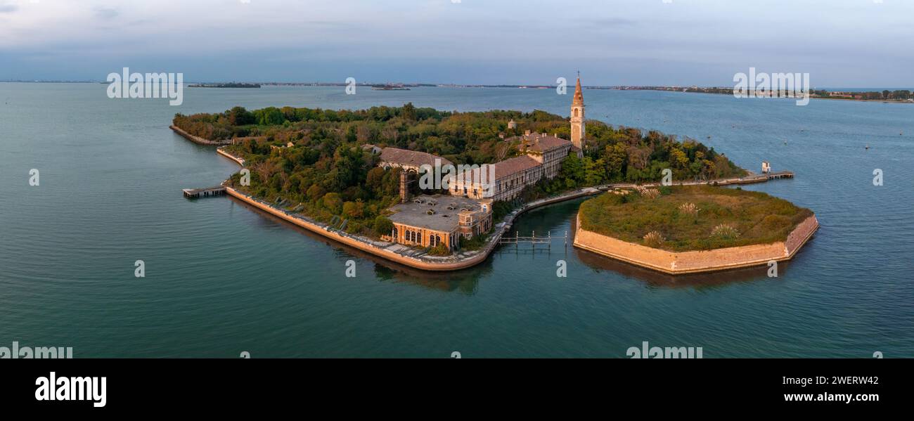 Aerial view of the plagued ghost island of Poveglia in the Venetian ...