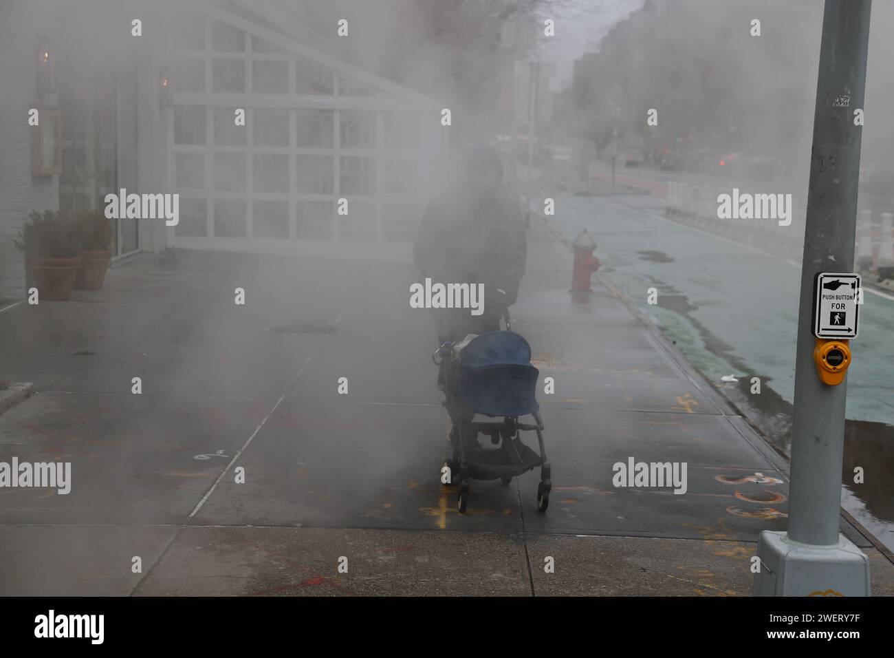 A view of Con Ed steam man hole sweeps through the air on First Avenue ...