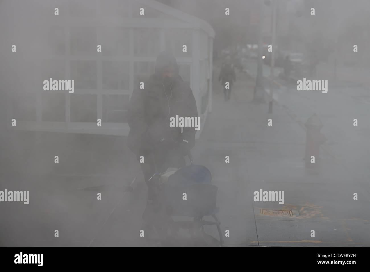 A view of Con Ed steam man hole sweeps through the air on First Avenue ...