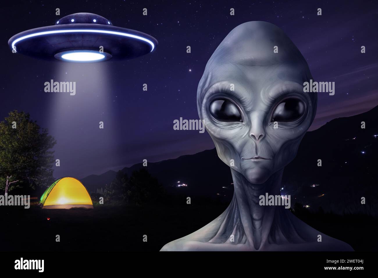 UFO. Flying spaceship emitting light beam over tent at night. Abduction ...