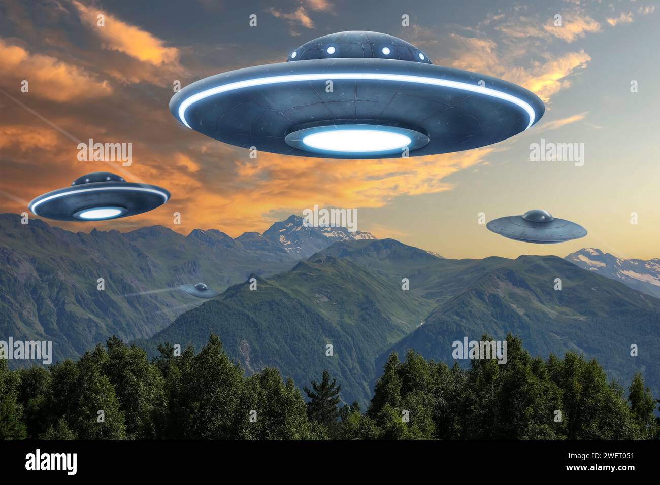 UFO. Alien spaceships flying over mountains. Extraterrestrial visitors ...