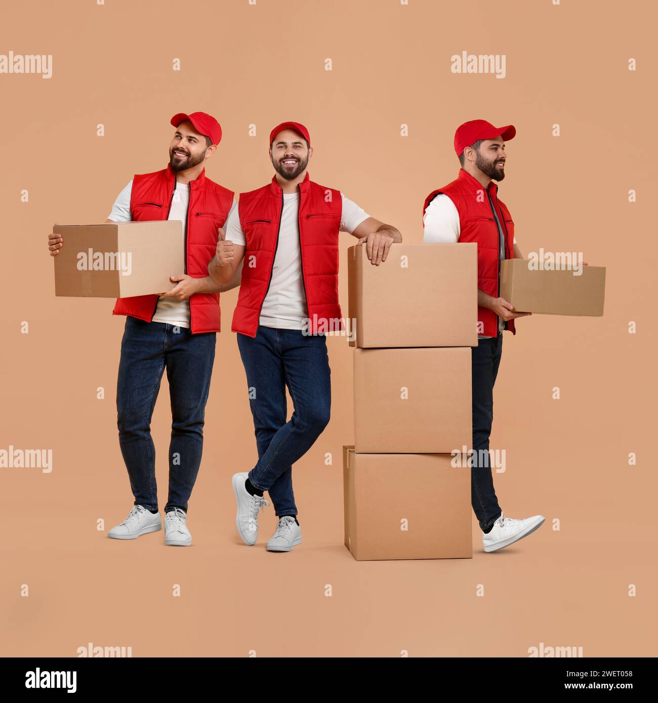 Delivery service. Happy courier with cardboard boxes on peach color ...