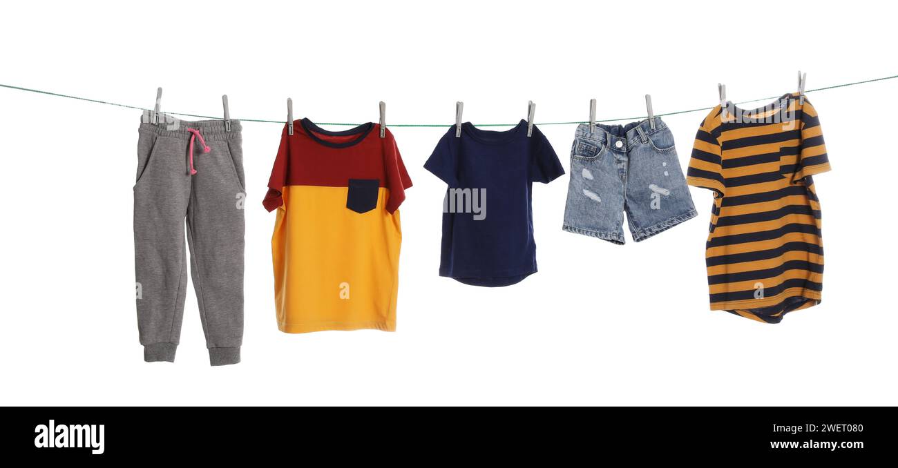 Different clothes drying on washing line against white background Stock ...