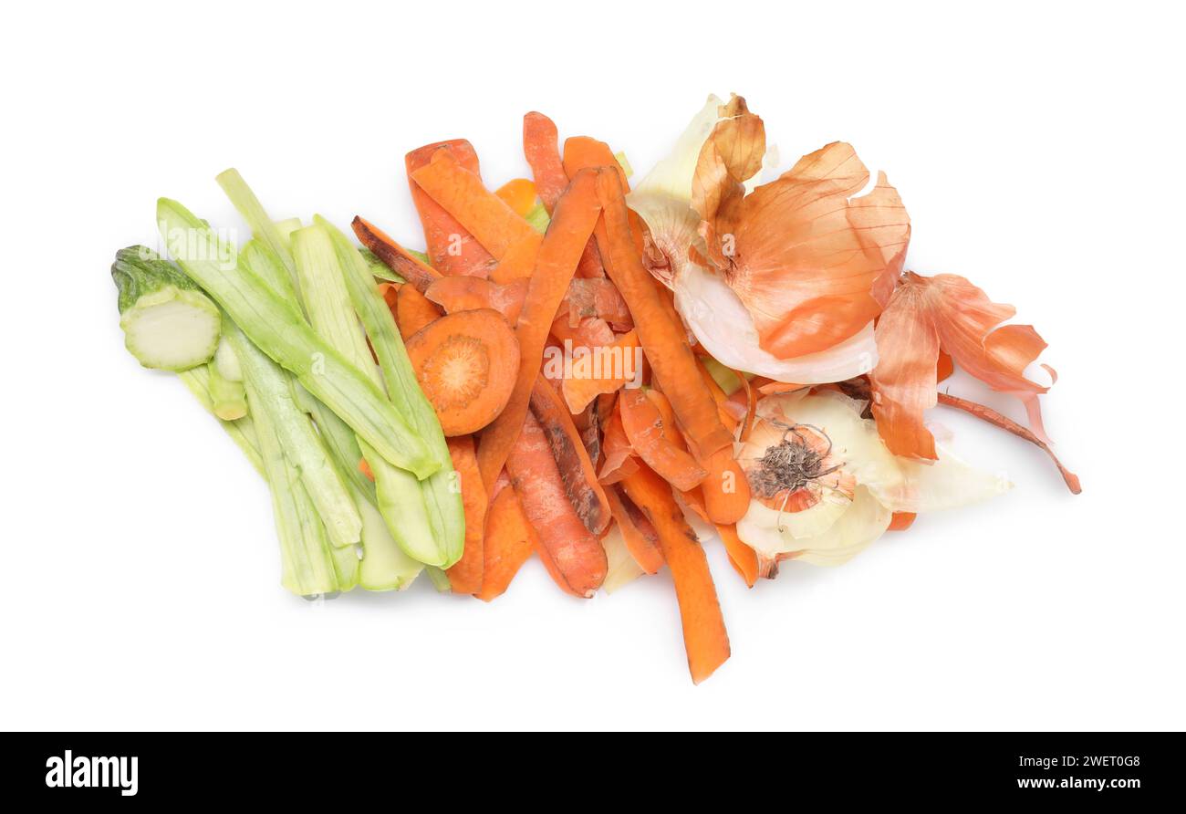Peels of fresh vegetables isolated on white Stock Photo - Alamy