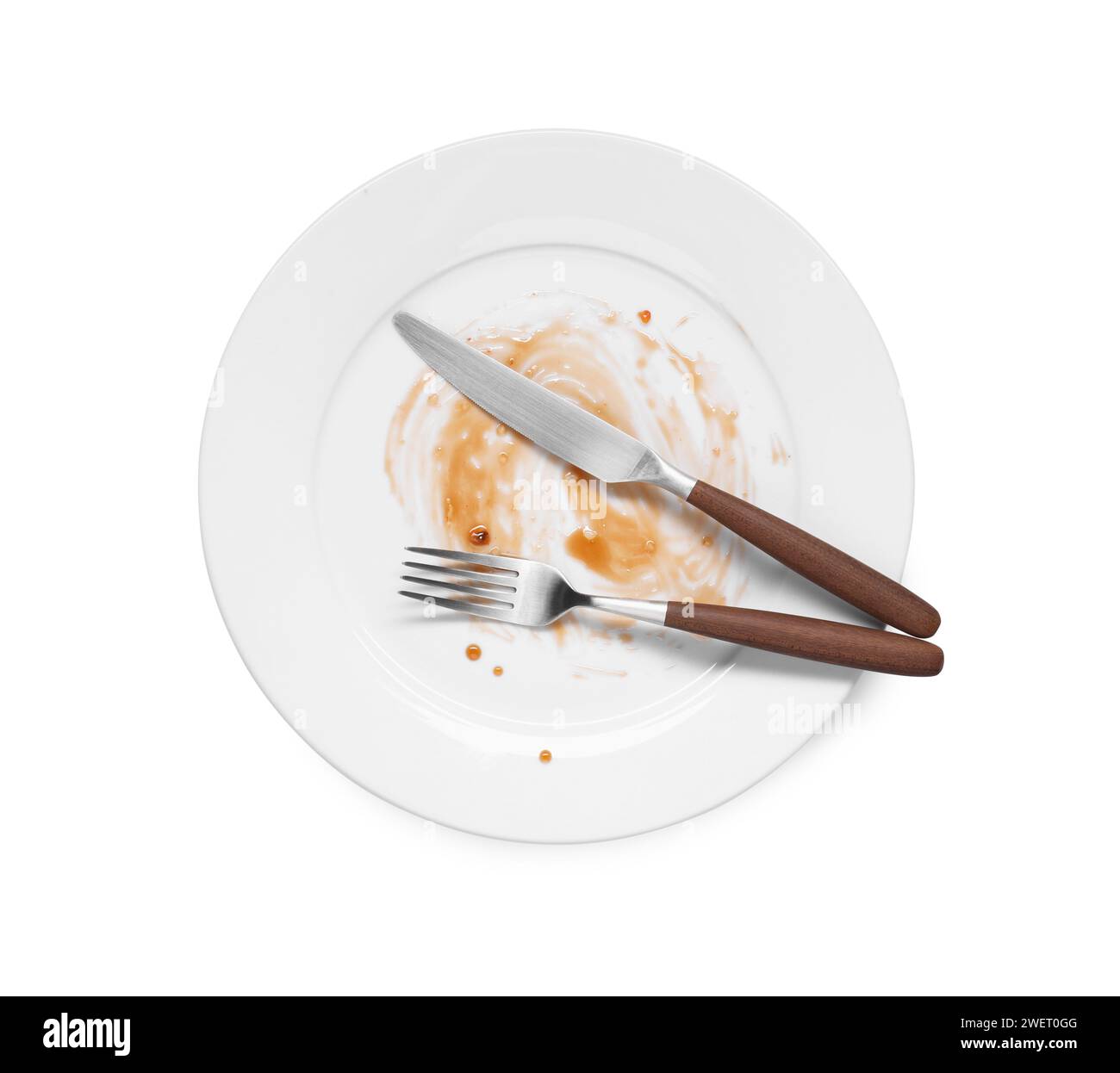 Dirty plate and cutlery on white background, top view Stock Photo - Alamy
