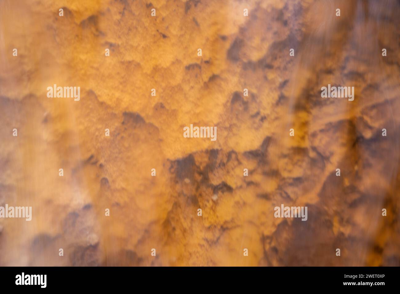 Rough Texture Of Orange Rock Through Rushing Water in Capitol Reef ...