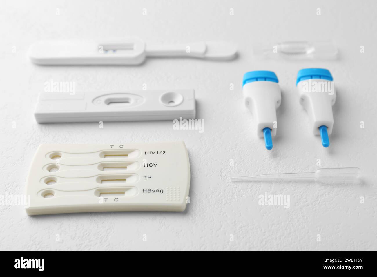 Disposable express test kits on white table Stock Photo - Alamy