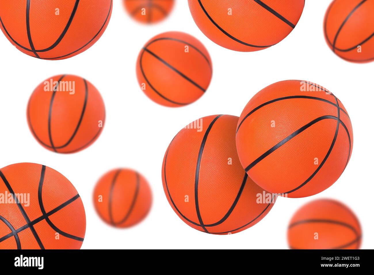 Many basketball balls falling on white background Stock Photo - Alamy