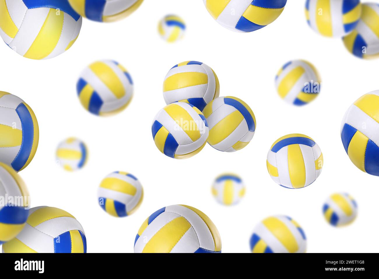 Many volleyball balls falling on white background Stock Photo - Alamy