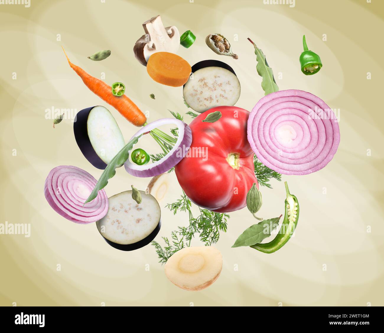 Different fresh vegetables and spices in air on beige background Stock ...