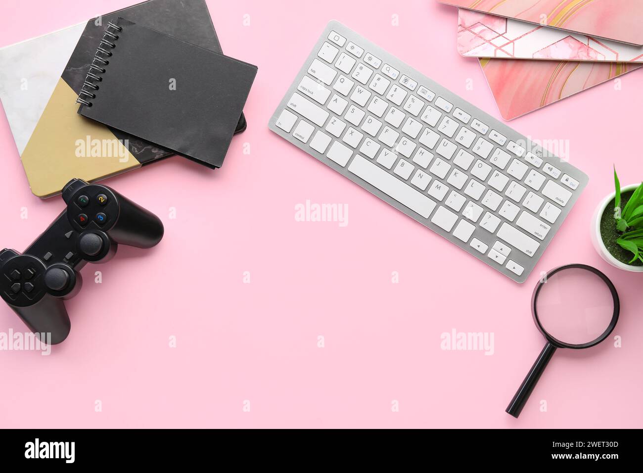 Composition with modern computer keyboard, joystick, magnifier and ...