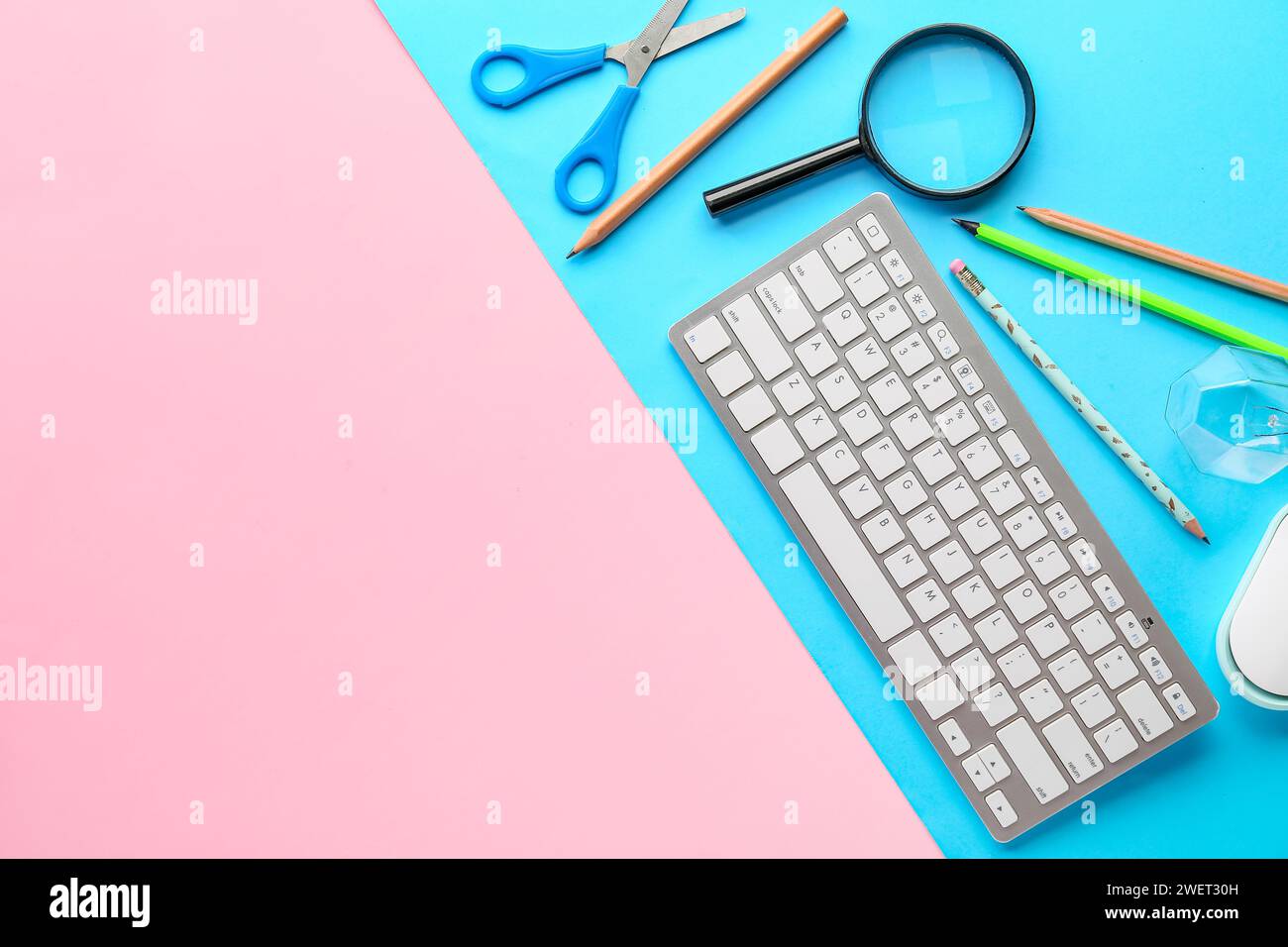 Composition with modern computer keyboard and stationery on color ...