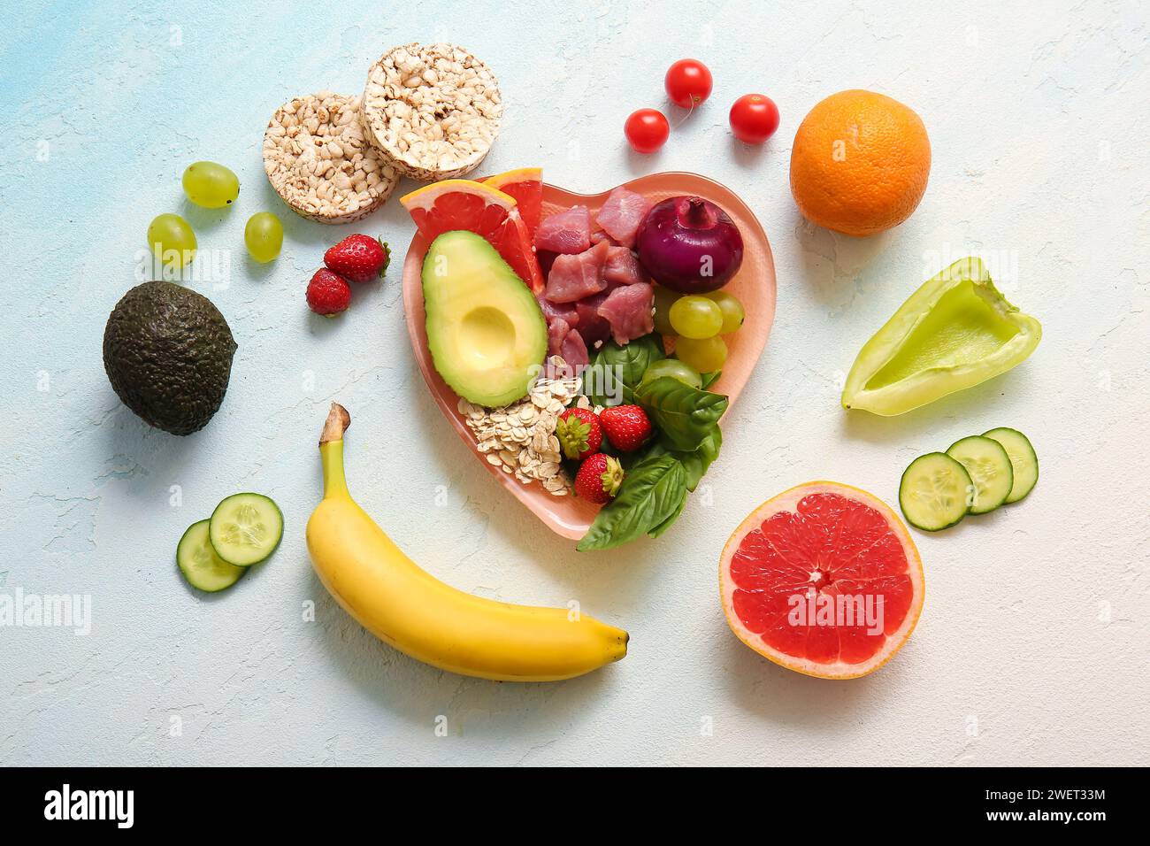 Plate with fresh healthy products on light background. Diet concept ...