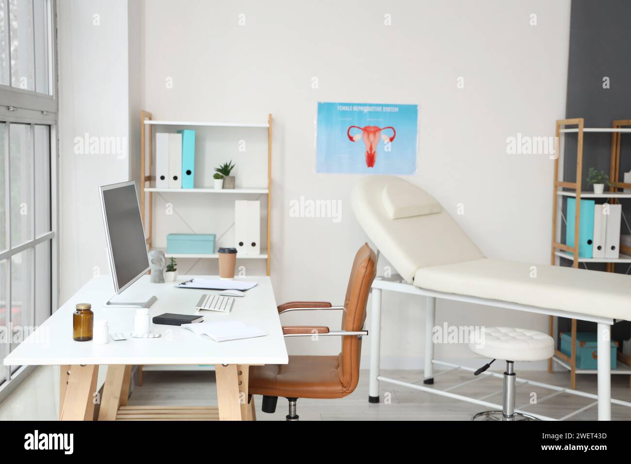 Interior of gynecologist's office with workplace and couch Stock Photo ...