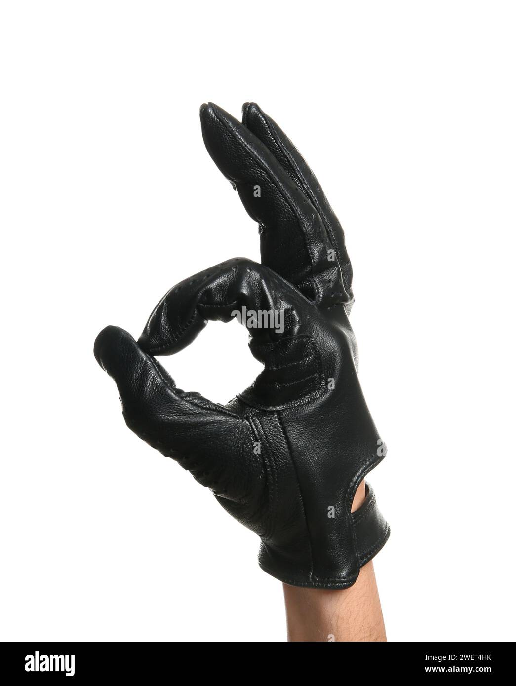 Man in black leather glove showing OK gesture on white background ...