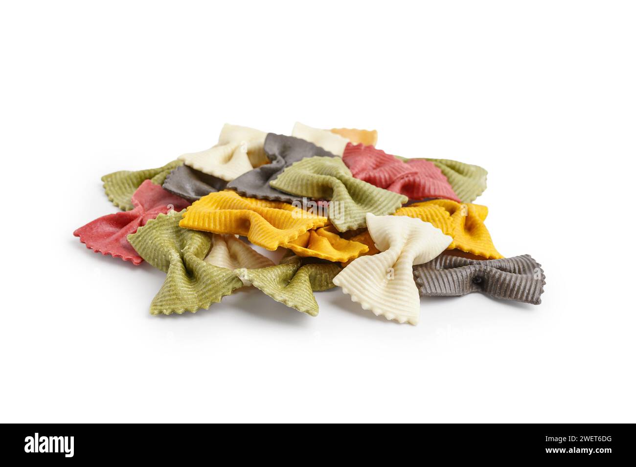 Colorful uncooked farfalle pasta on white background Stock Photo - Alamy