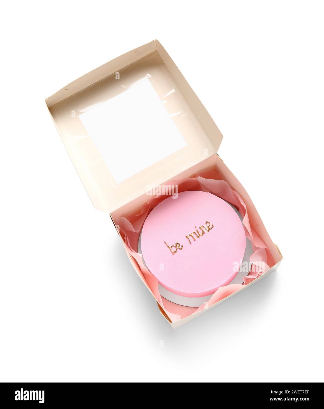 Box with pink bento cake on white background. Valentine's Day ...