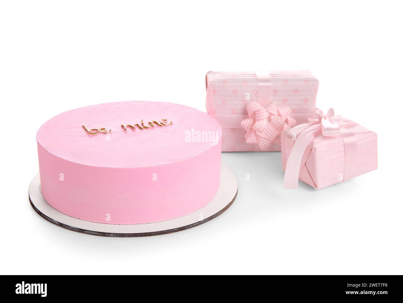Pink bento cake with gift boxes on white background. Valentine's Day ...