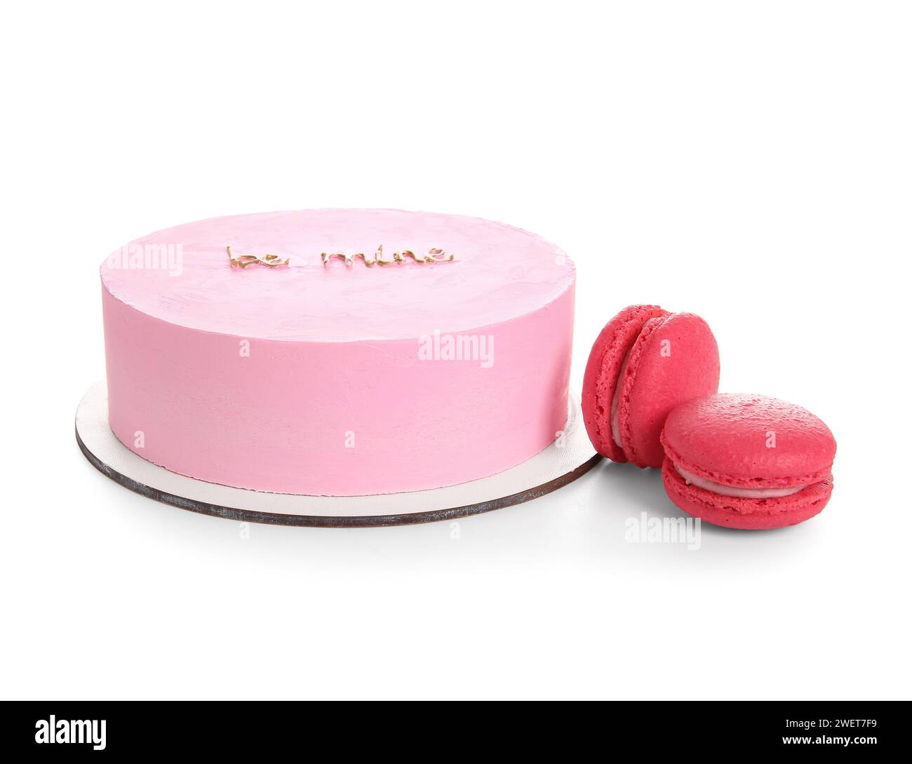 Pink bento cake with macaroons on white background. Valentine's Day ...