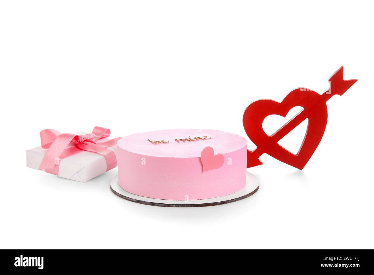Pink bento cake with gift box and decorative heart on white background ...