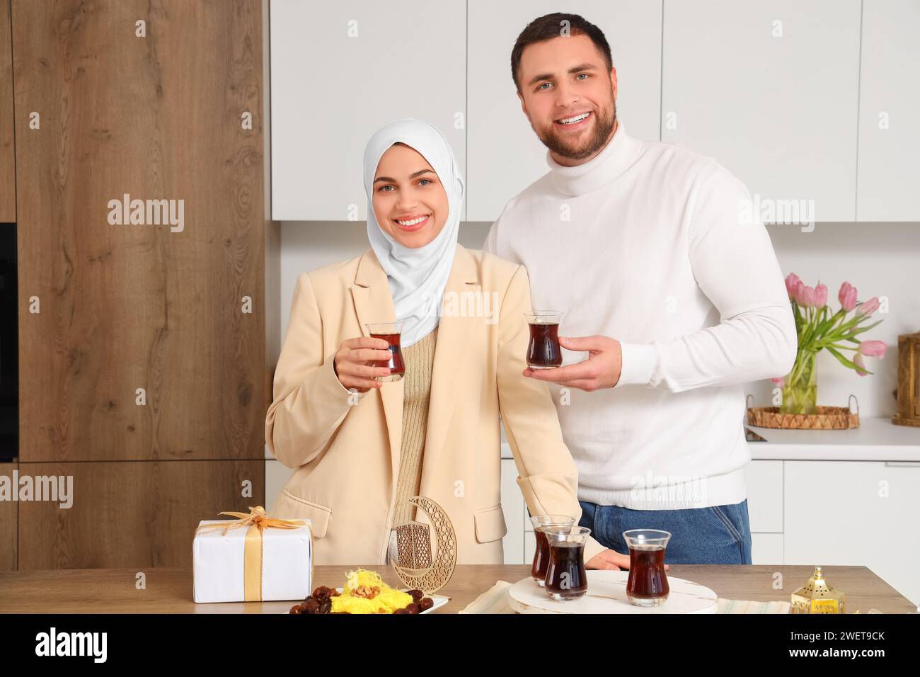 Muslim family celebrating eid dinner hi-res stock photography and ...