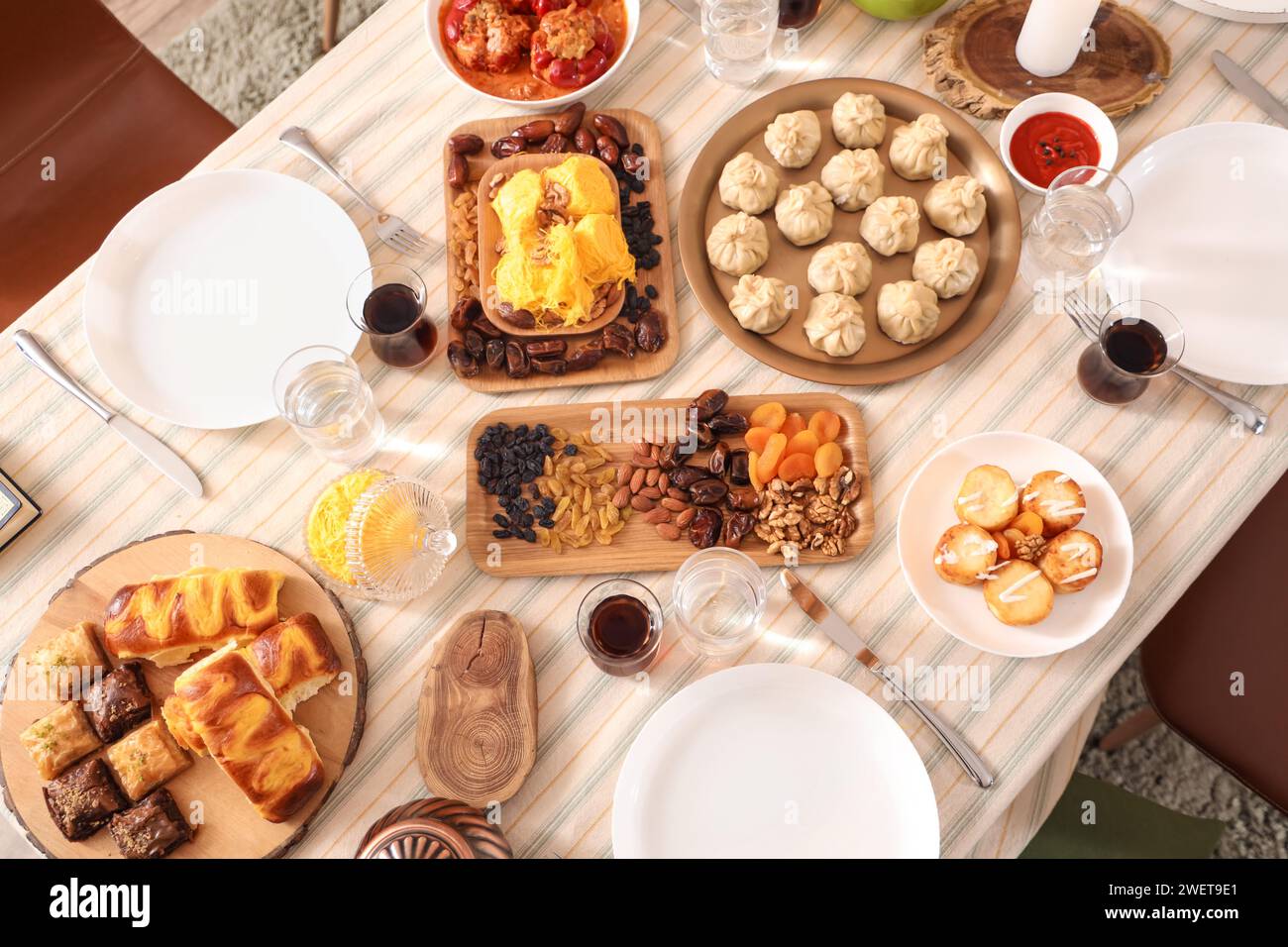 Traditional Eastern dishes for Ramadan on dining table in room, top ...