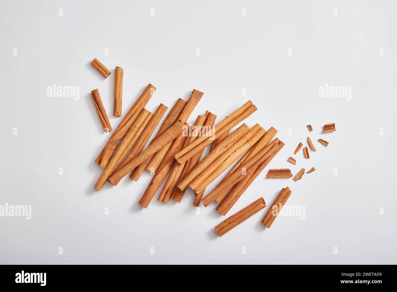 Top view of cinnamon sticks (Cinnamomum) isolated on white background ...
