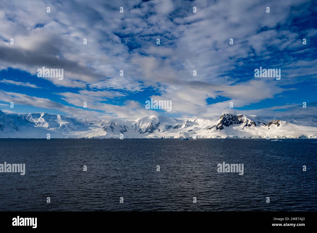 Landscape of glacier covered mountains around the Antarctic Peninsula ...