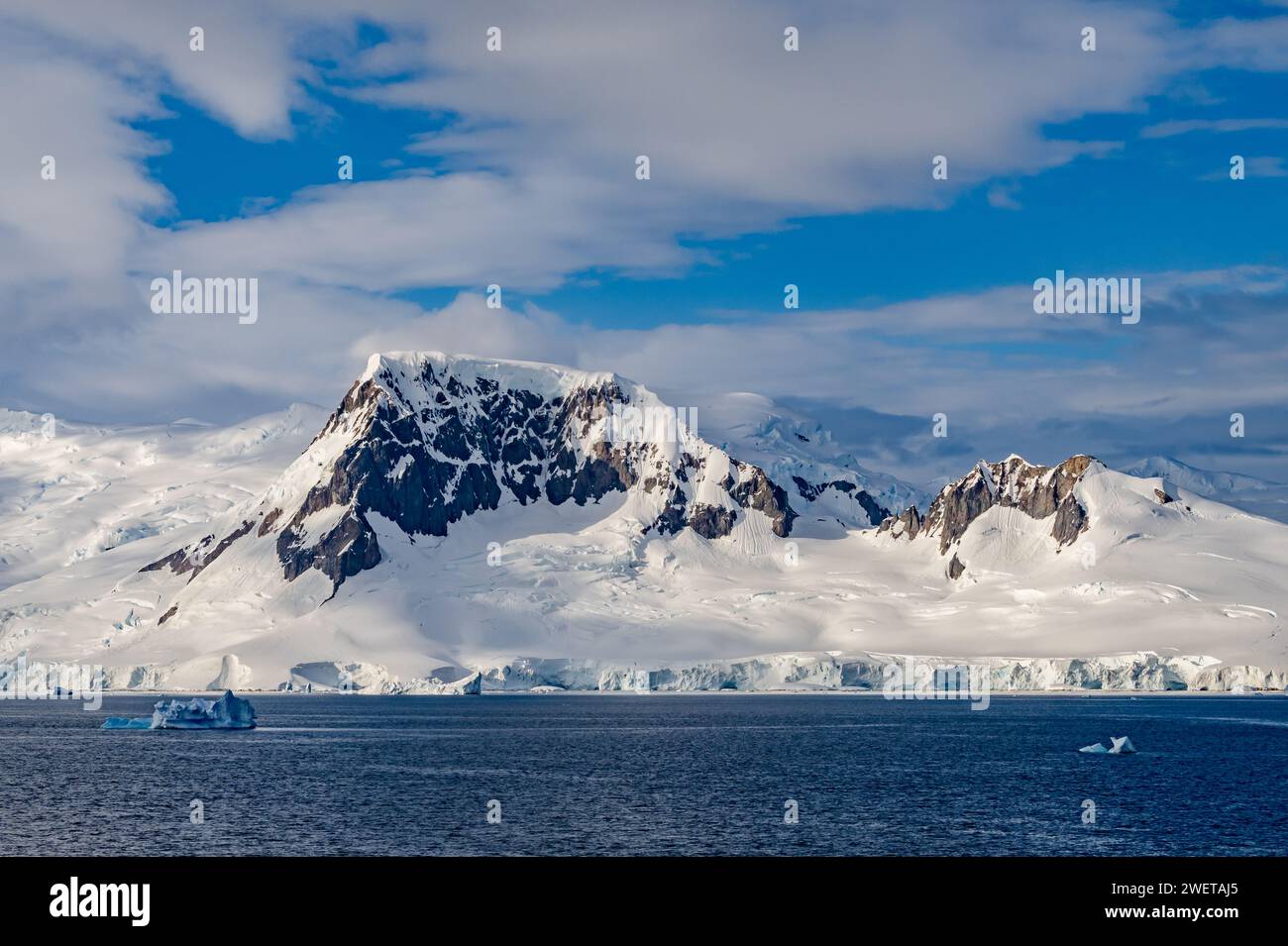 Landscape of glacier covered mountains around the Antarctic Peninsula ...