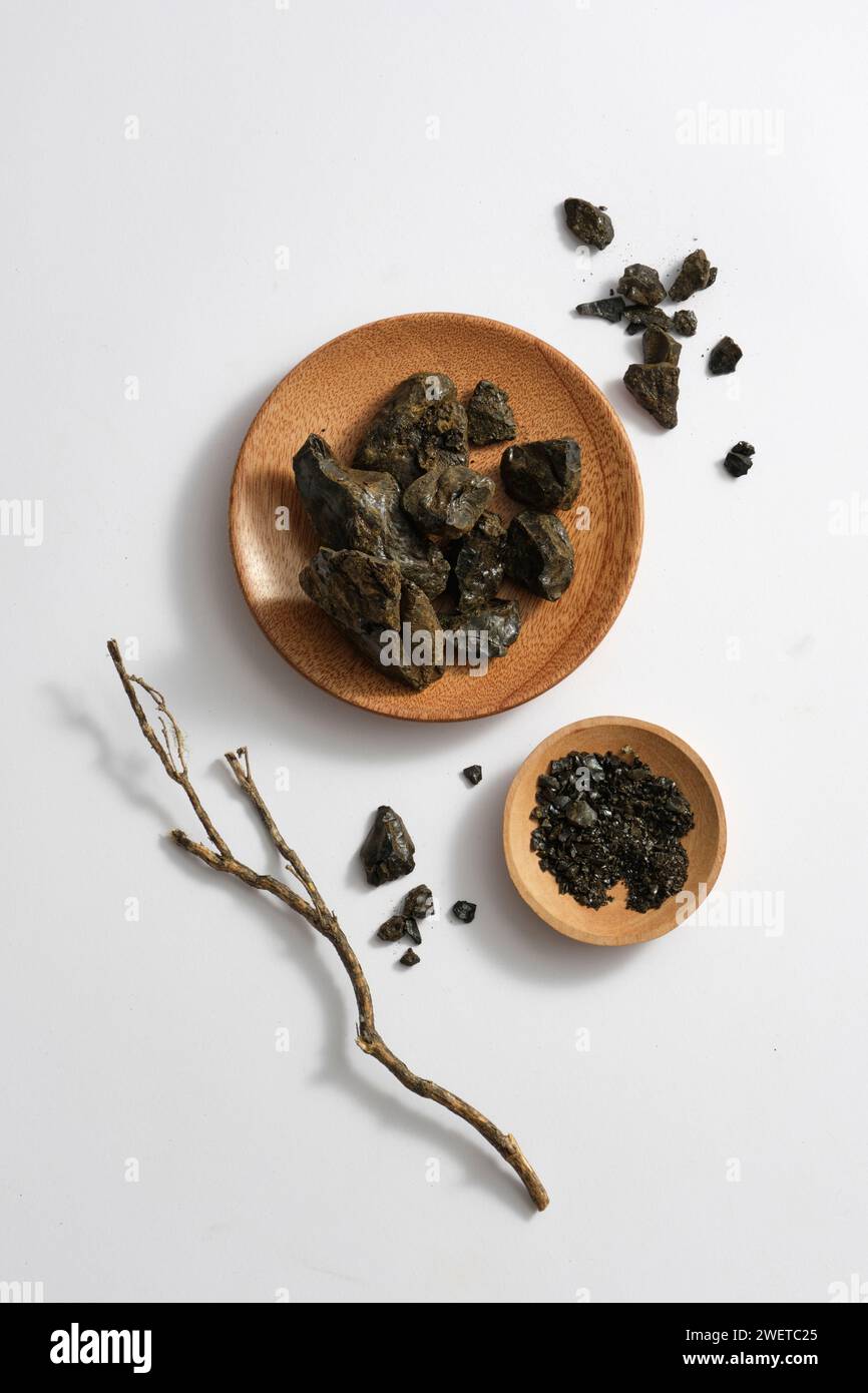 Aloe resin, when concentrated, forms hard black lumps, which are placed ...