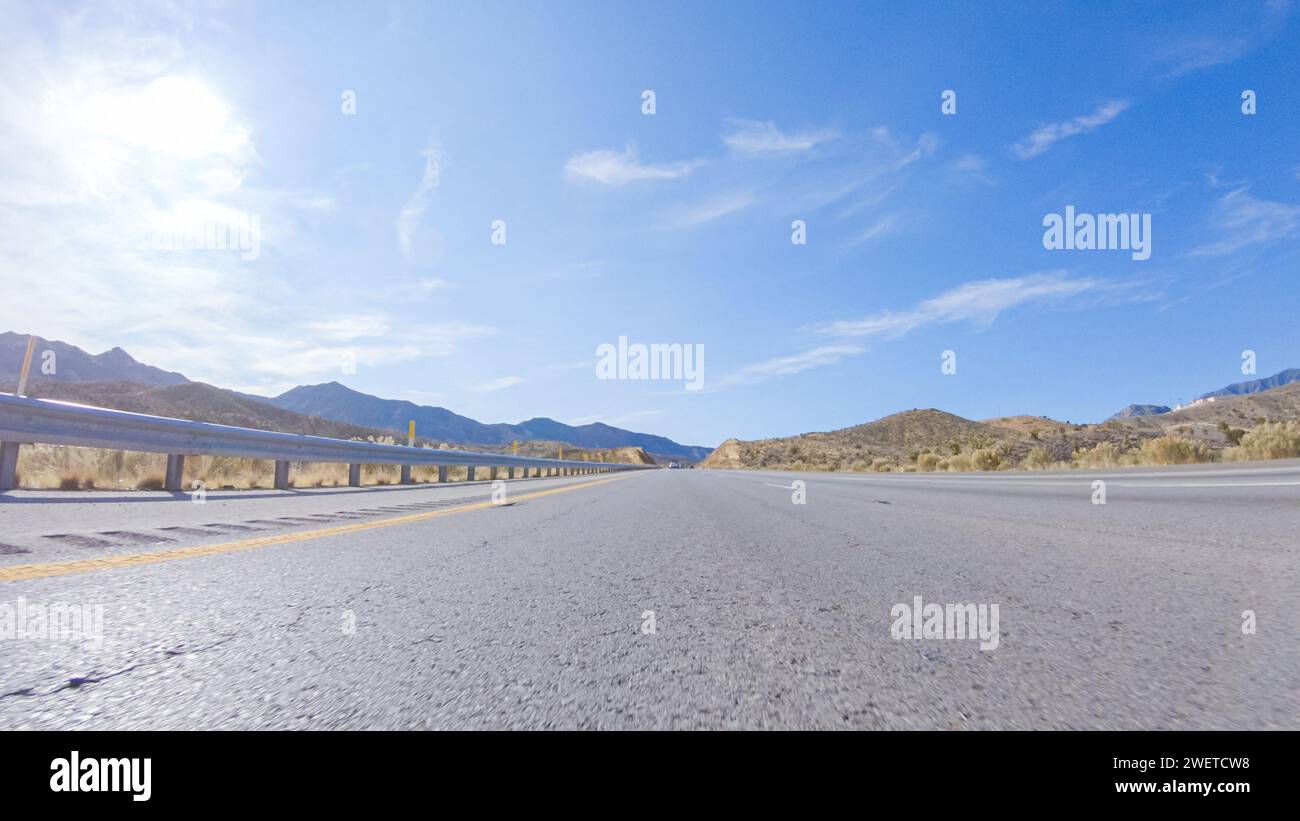 Daytime Road Trip: Nevada to California on HWY 15 Stock Photo - Alamy