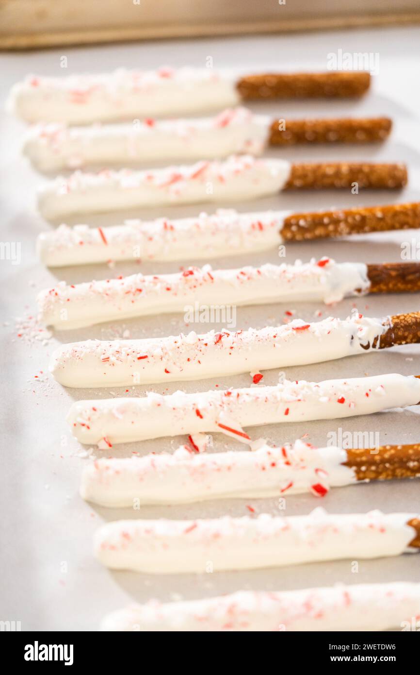 Candy cane chocolate covered pretzel rods Stock Photo - Alamy