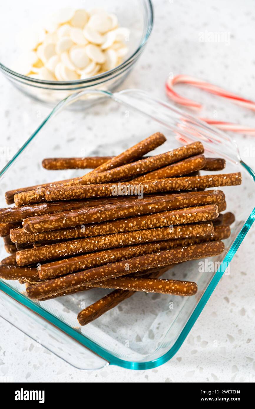Candy cane chocolate covered pretzel rods Stock Photo - Alamy