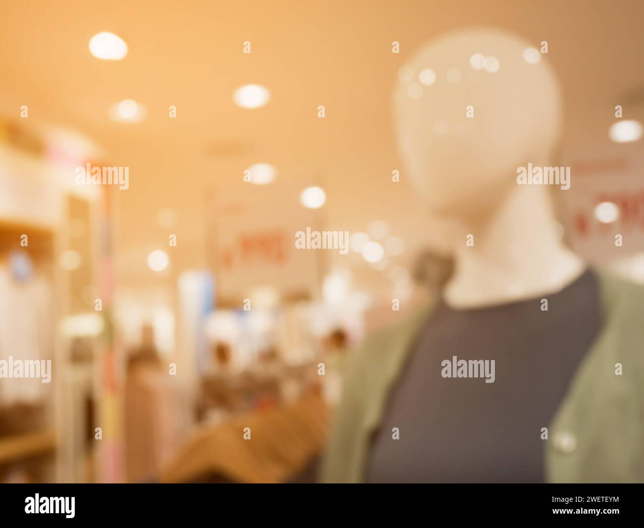blur clothing store background in shopping mall Stock Photo - Alamy