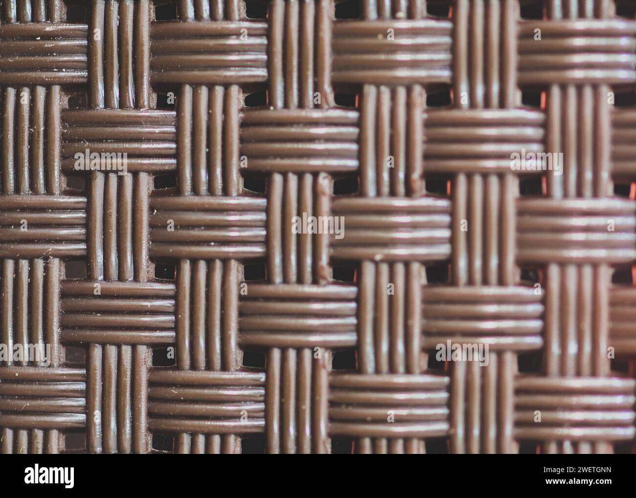 Woven texture of a wicker basket weave, showcasing the intricate ...