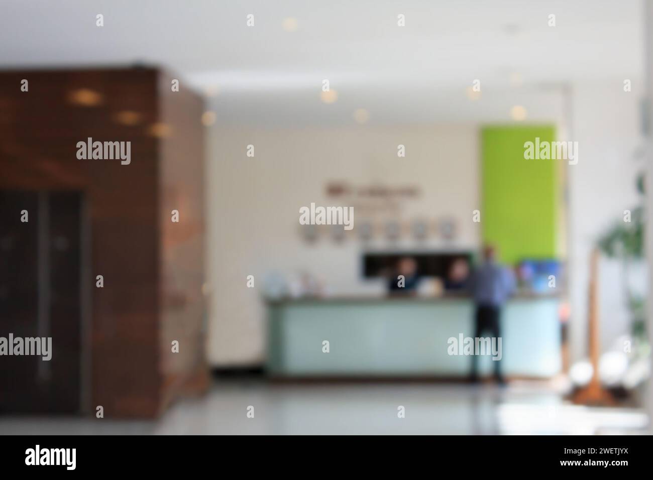 Abstract hotel lobby blur background Stock Photo - Alamy