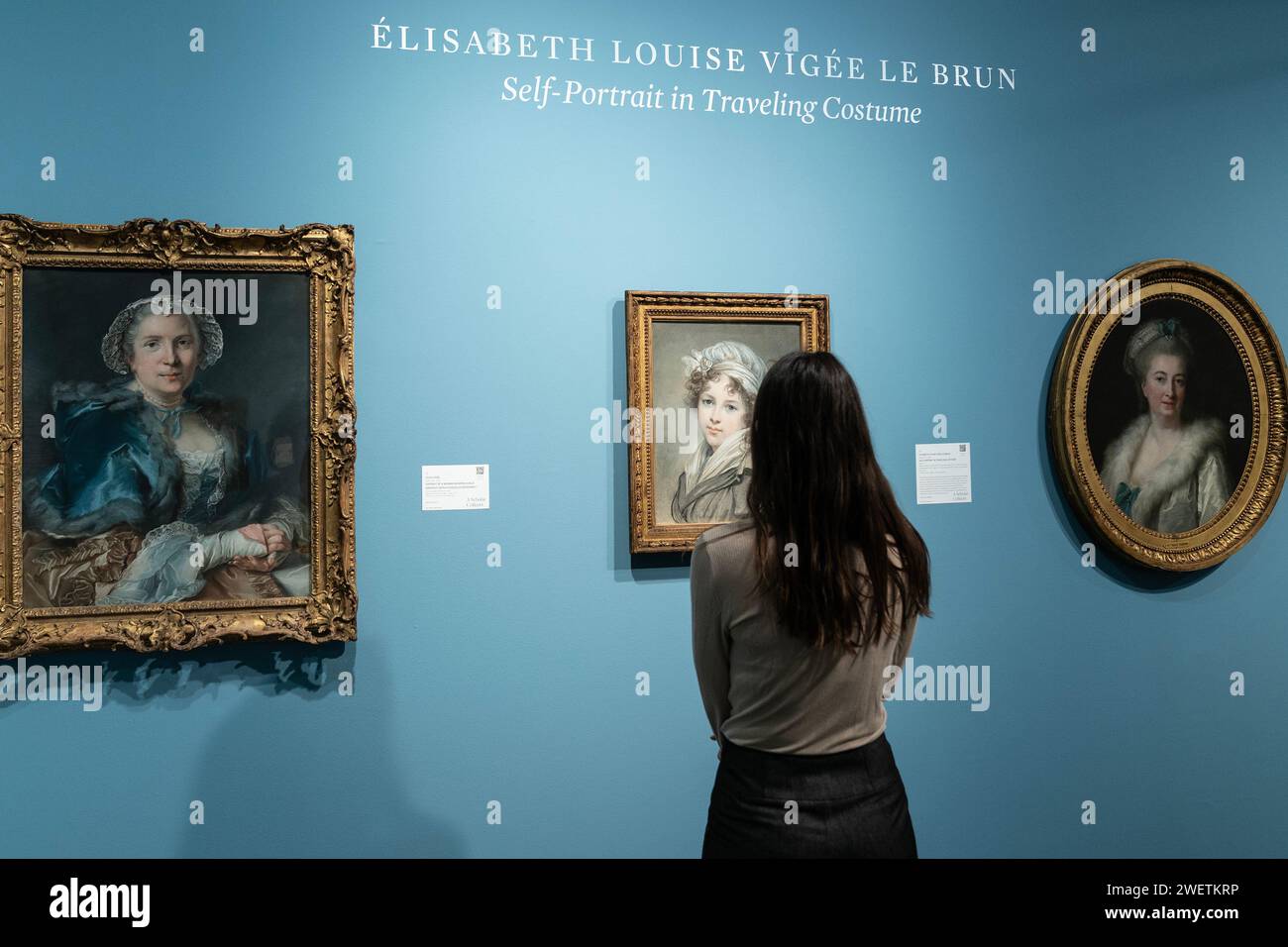 New York, USA. 26th Jan, 2024. A woman seen examine Self Portrait by ...