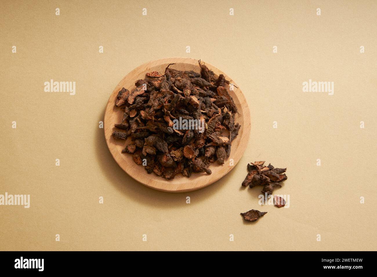 Scene of cyperus tuber put on round dishes on brown background. Cyperus ...