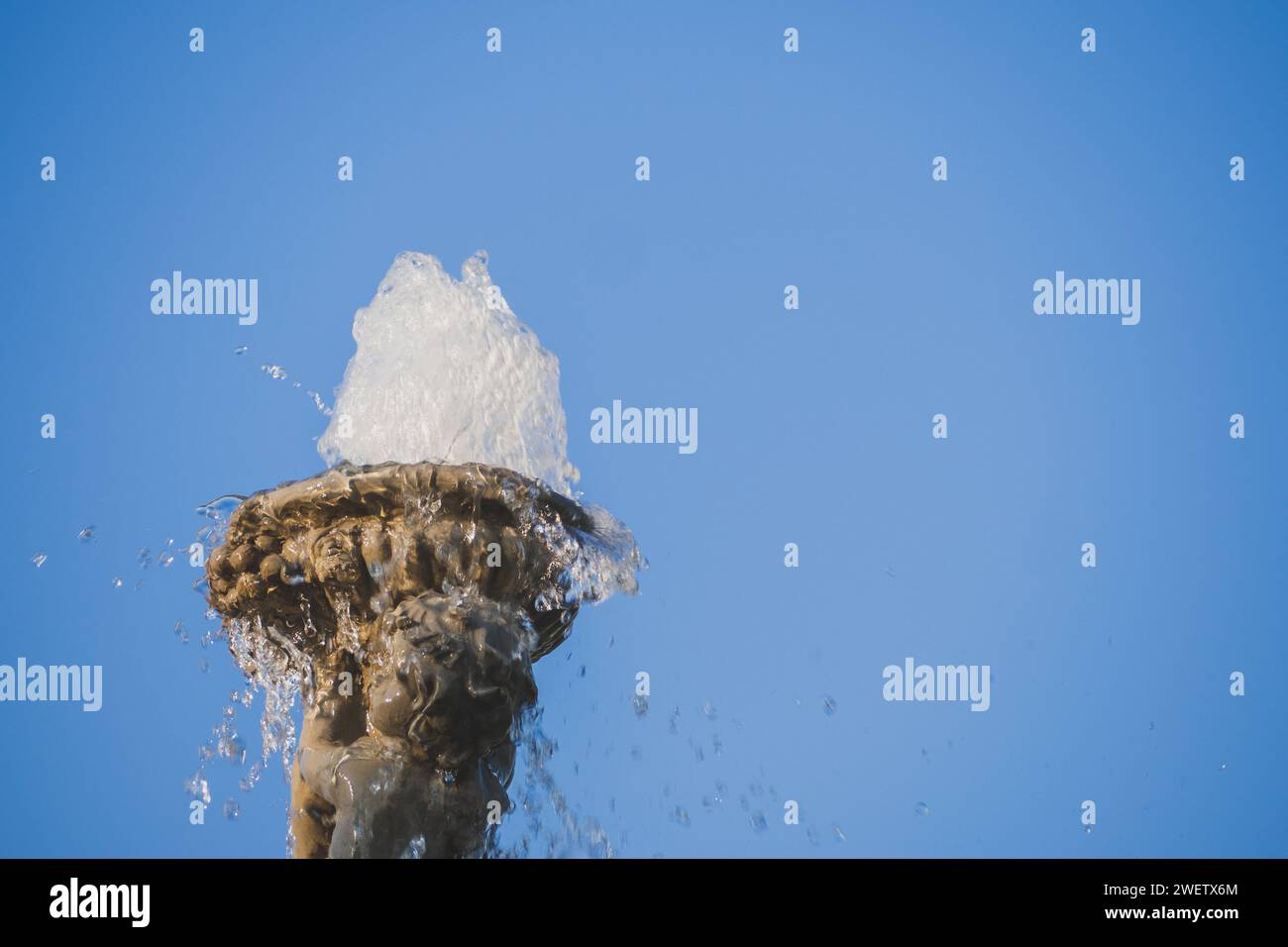 Ancient Roman Column with Stone Statue Amidst Ruins Stock Photo - Alamy